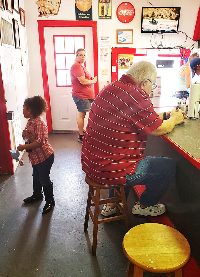 A multi-generational gathering spot where the conversation flows as freely as the mustard. Everyone's equal at the hot dog counter.