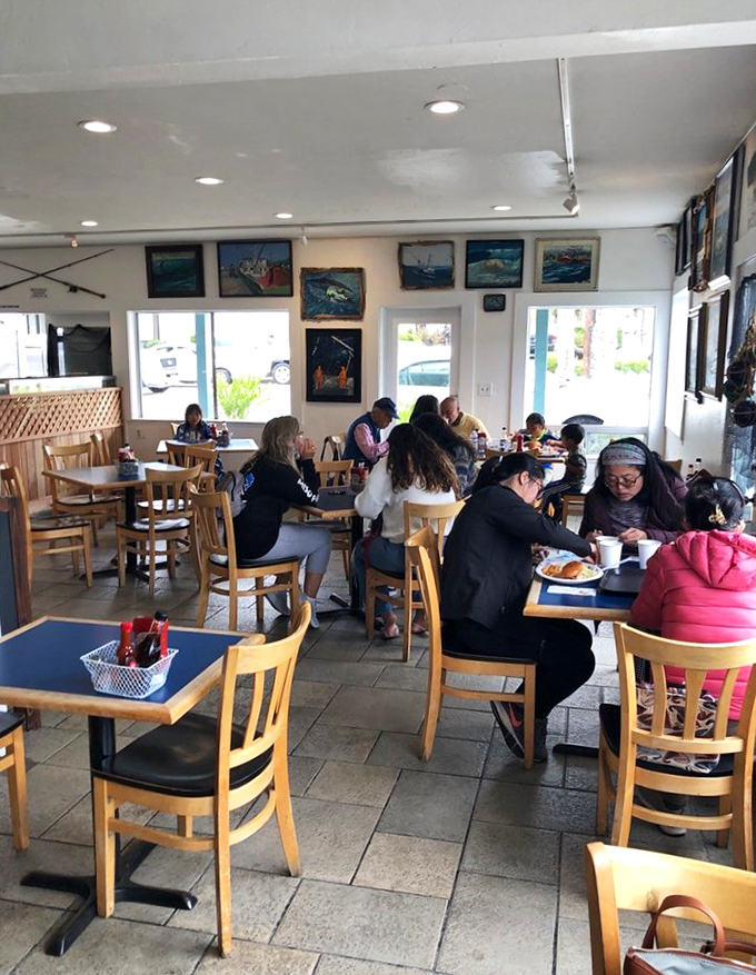 A dining room filled with people who look like they know something you don't&mdash;until you taste the food and join their secret society.