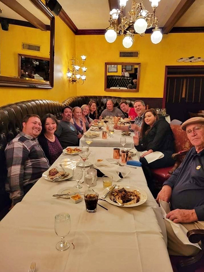 Great meals create great memories. This table of happy diners isn't just eating dinner—they're building a story they'll tell for years.