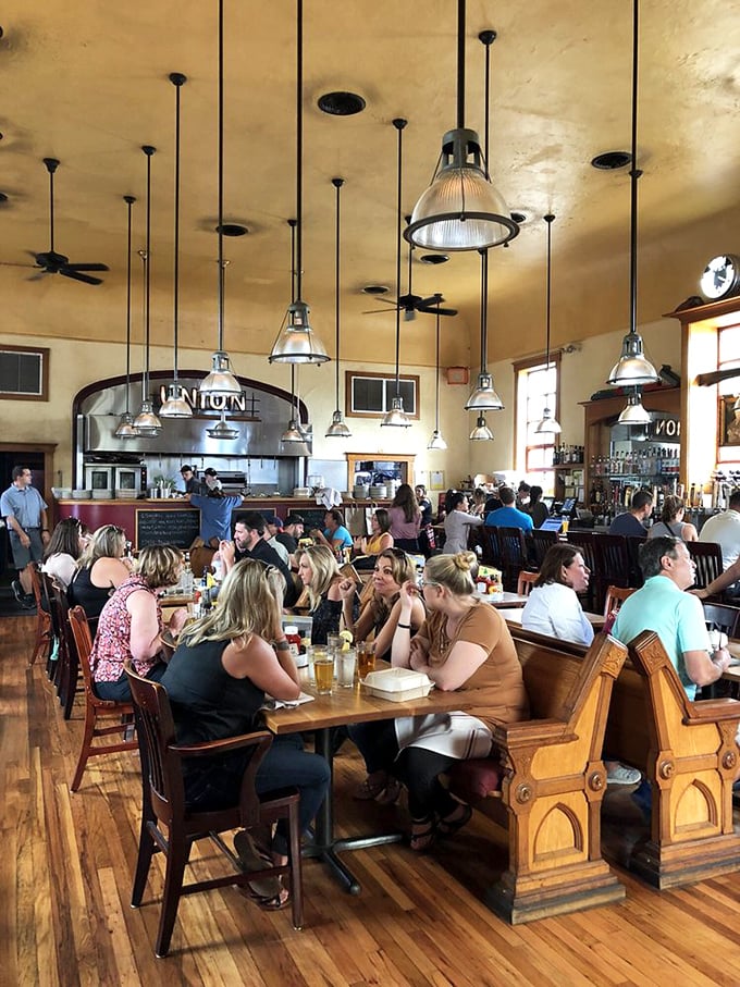 The universal language of good food being spoken at every table. Notice nobody's looking at their phones&mdash;that's the true magic of exceptional barbecue.