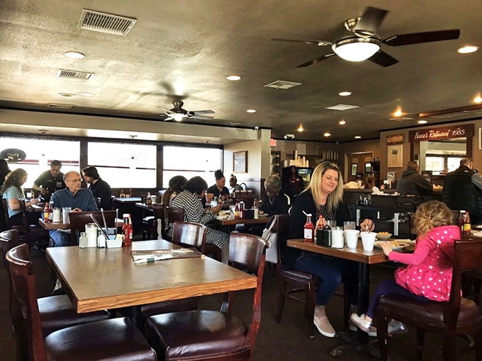 The true measure of a great local spot: tables filled with people who look like they've been coming here for decades.