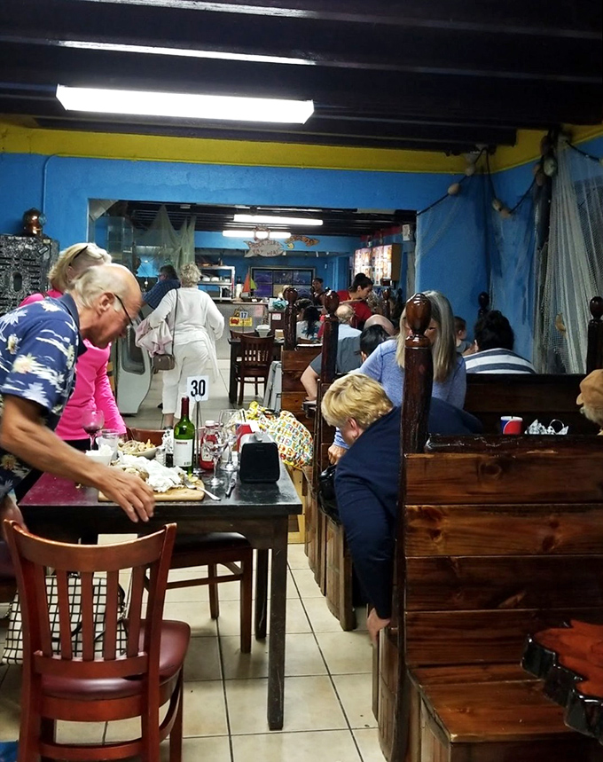 The true measure of a local spot: tables filled with Hawaiian shirts, animated conversations, and plates scraped clean.