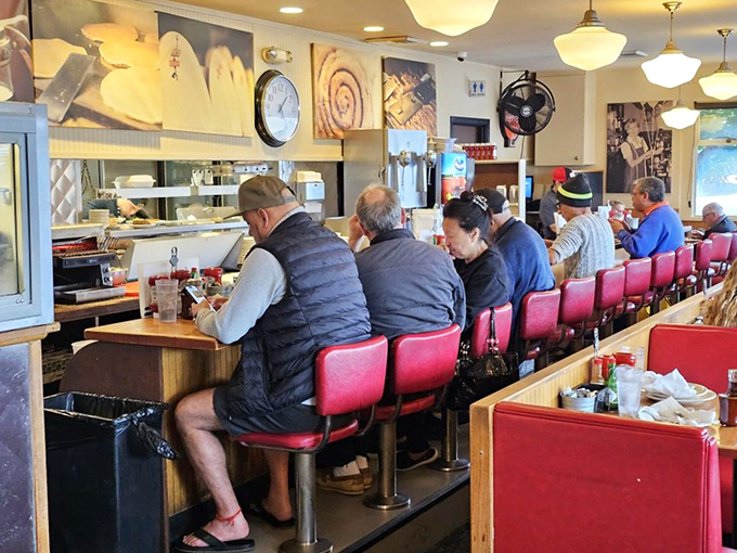 The counter crew&mdash;breakfast's front-row seats where regulars gather like old friends at a reunion of the "Early Birds Club."
