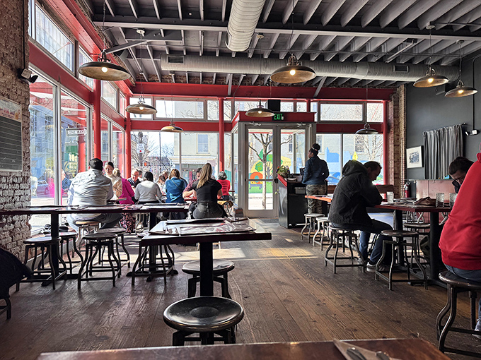 Where chicken enthusiasts gather to worship at the altar of crispy goodness. The diverse crowd proves great food transcends all demographics. 