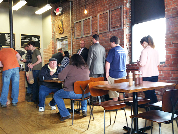 The diverse crowd says everything: good barbecue is the great equalizer. Business suits and work boots standing in the same line.