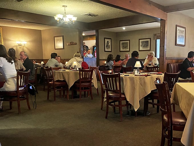 Diners lost in conversation and contemplation of their meals&mdash;the universal language of good food bringing people together.