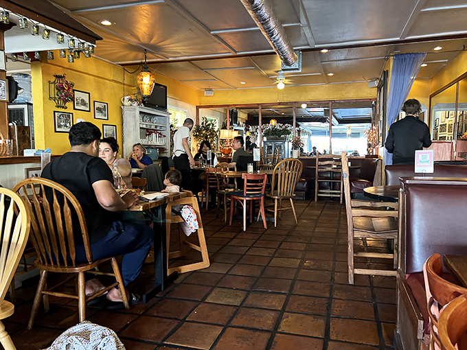 Families and friends gathered around tables, proving that in the age of smartphones, pizza still has the power to make people look up.