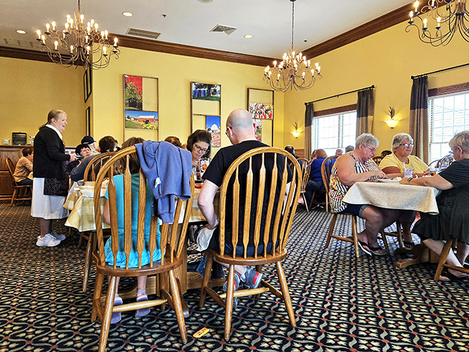A bustling dining room where strangers often become friends over shared appreciation of hearty portions and the unmistakable buzz of "you've got to try this!"