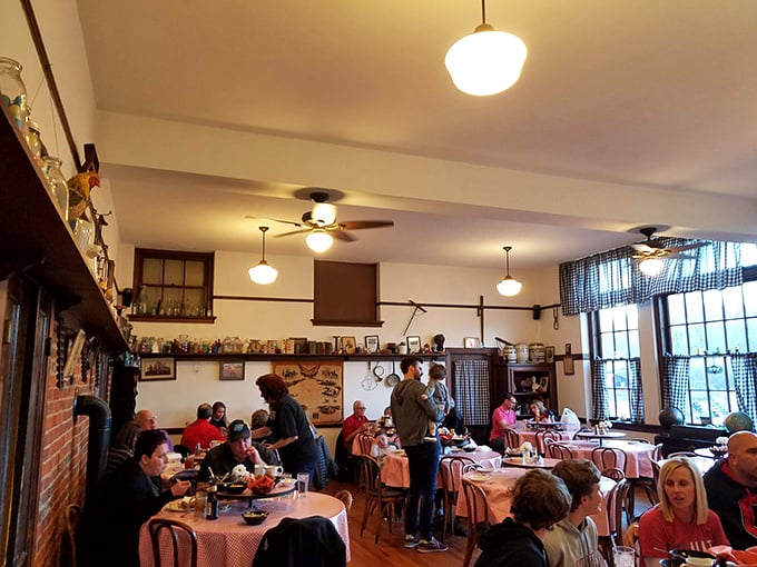 The buzz of conversation fills the room as diners experience that rare moment when Instagram can wait because the food demands immediate attention.