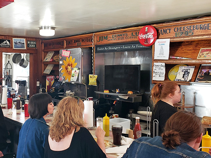 "Enter As Strangers—Leave As Friends" isn't just a sign on the wall; it's the unofficial motto of this community gathering spot.
