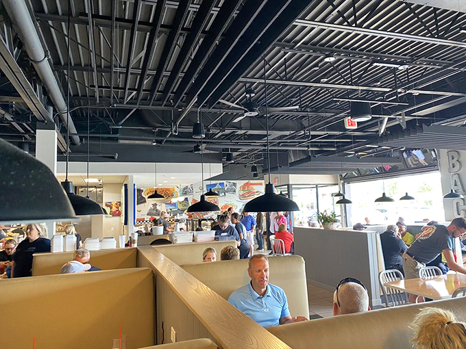 A bustling dining room where strangers become friends united by their mutual appreciation for cheese-covered culinary traditions.