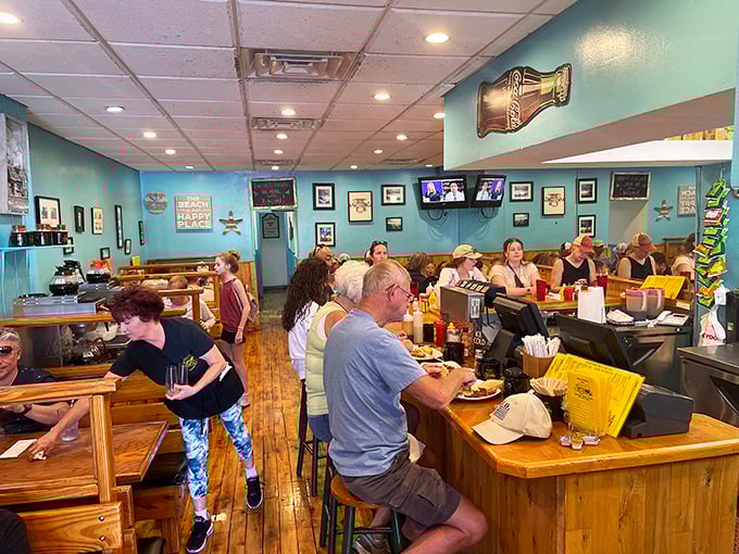Where locals and tourists unite in the universal language of "pass the hot sauce." Breakfast democracy in action.