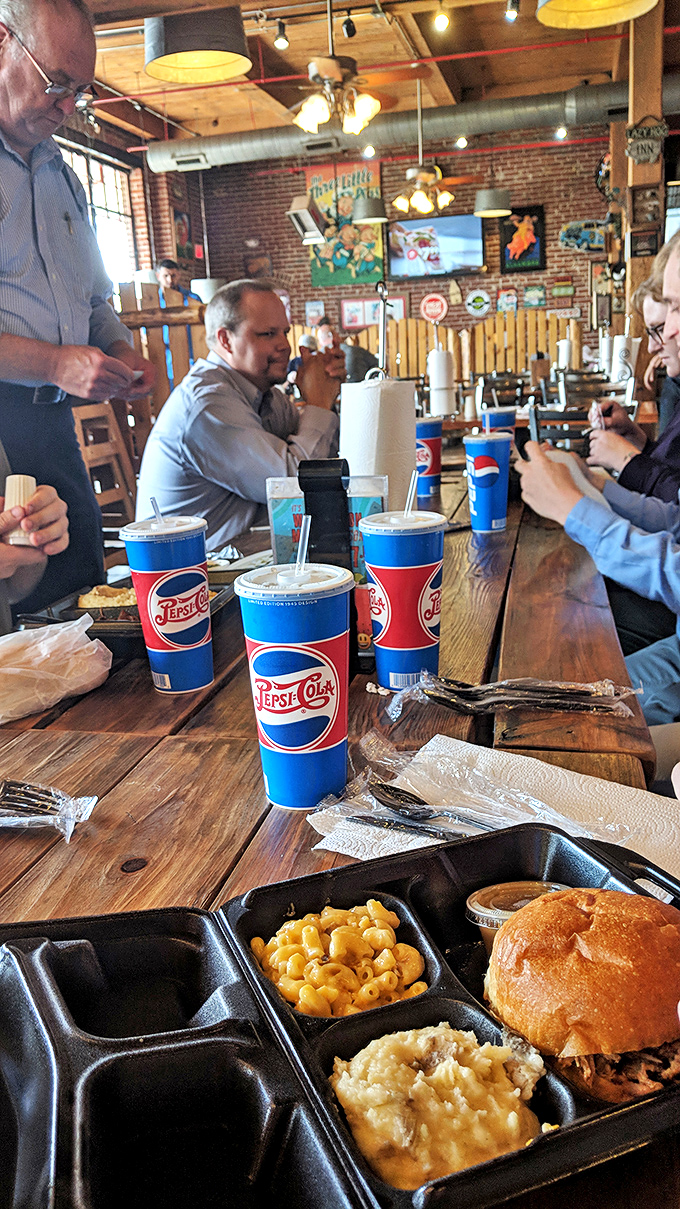 Where business meetings transform into barbecue appreciation societies. Notice how nobody's checking their phones&mdash;the food commands full attention.