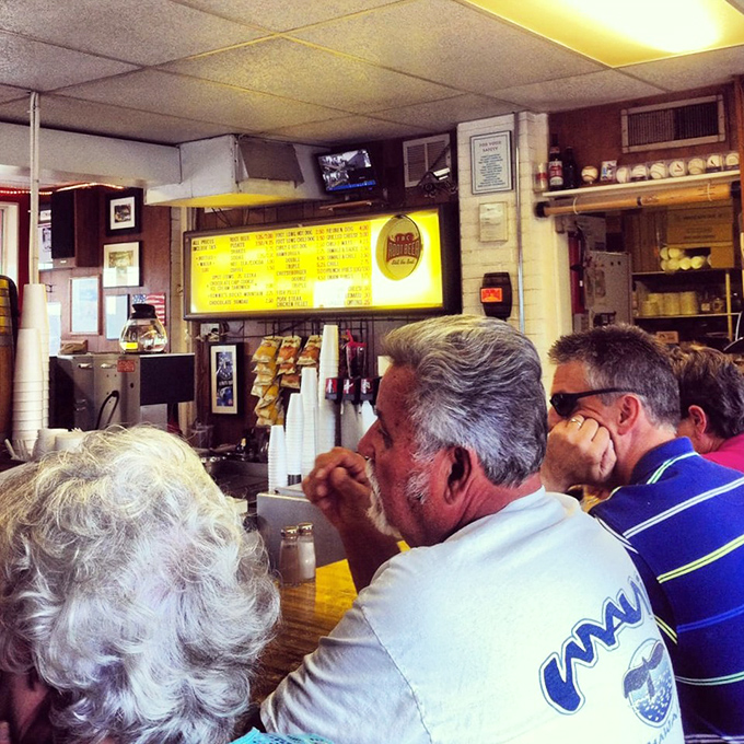 The counter at Carl's doesn't just serve food—it serves as a community table where strangers become neighbors over shared appreciation of smashed burgers.