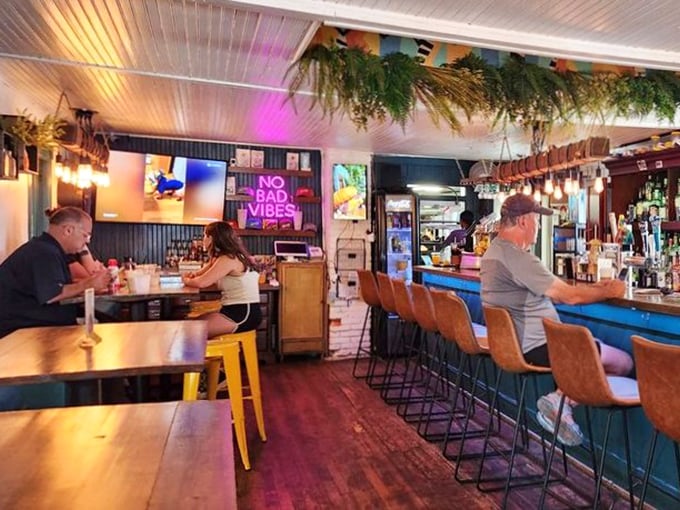 Happy diners enjoying the kind of meal that creates vacation memories and makes you want to become a regular customer immediately.