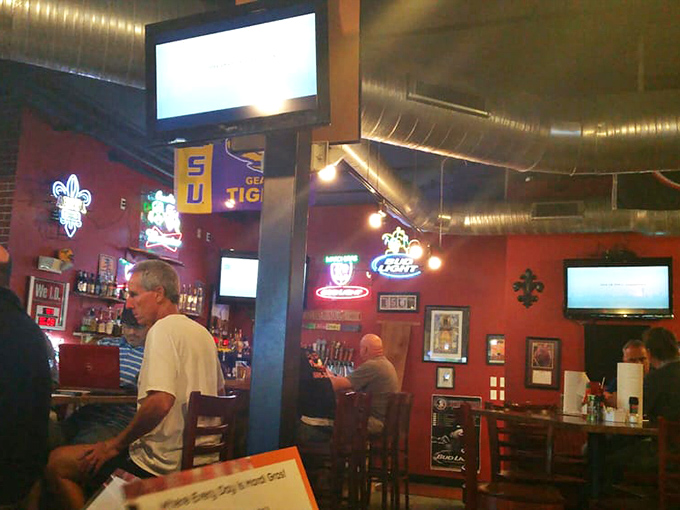 Where sports fans, politicians, and food lovers converge under college banners &ndash; the democratic republic of deliciousness that is Coosh's bar area.