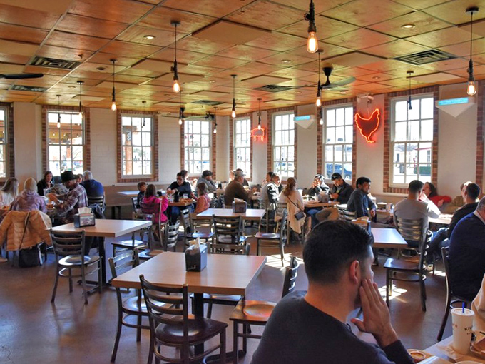 A full house at lunchtime isn't just customers—it's a congregation of believers gathered to worship at the altar of perfect post oak smoke.