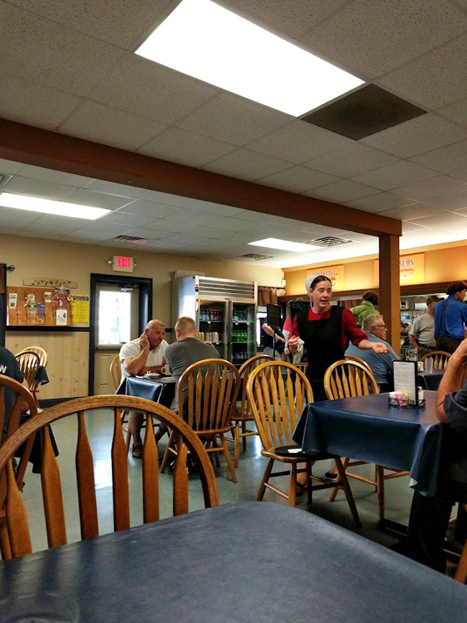 Where wooden chairs have supported generations of satisfied diners. The servers move with the practiced grace of dinner-rush ballet dancers.