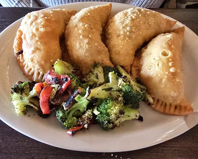 Empanadas with a side of vegetables &ndash; because balance is important when you're about to order three margaritas and flan.