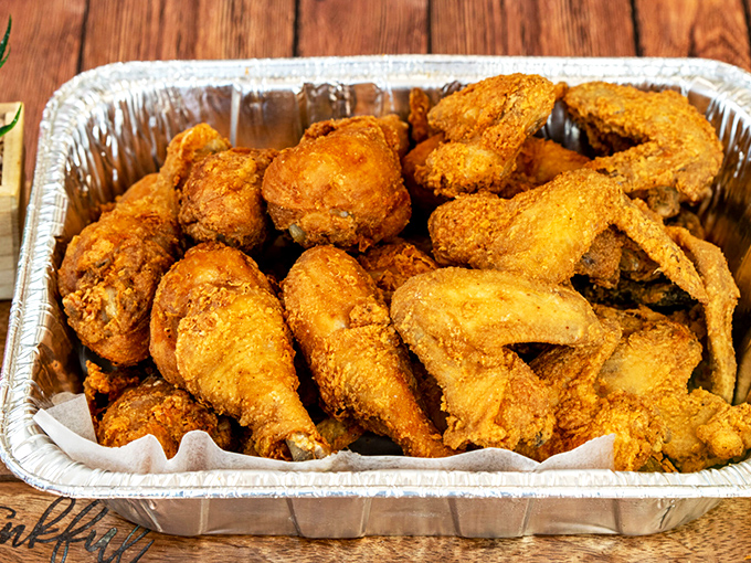 Another aluminum container of happiness. This chicken doesn't need fancy plating&mdash;it lets the golden, crispy perfection do all the talking.