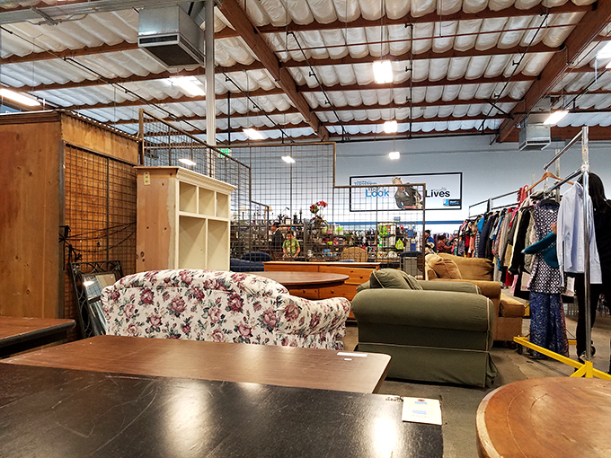 Furniture vignettes create mini living rooms throughout the warehouse. That floral couch has stories to tell and is just waiting for its second act.