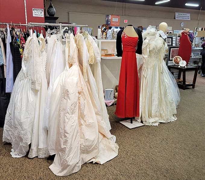 Wedding and formal gowns standing at attention, ready for their second chance at making memories. That red dress means business.
