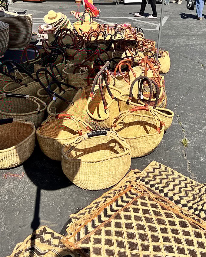 Handwoven baskets with leather handles that somehow make you want to immediately plan a picnic or redesign your entryway.