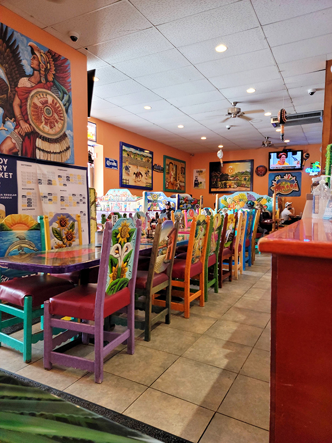 The vibrant murals and colorful chairs aren't just decoration—they're visual appetizers preparing you for the feast of flavors to come.