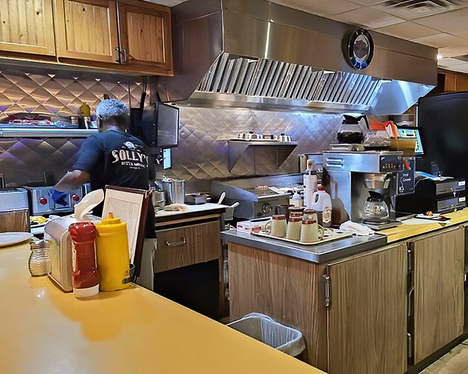 Where the magic happens: a well-seasoned grill that's seen more butter than Paula Deen's kitchen on Christmas morning.