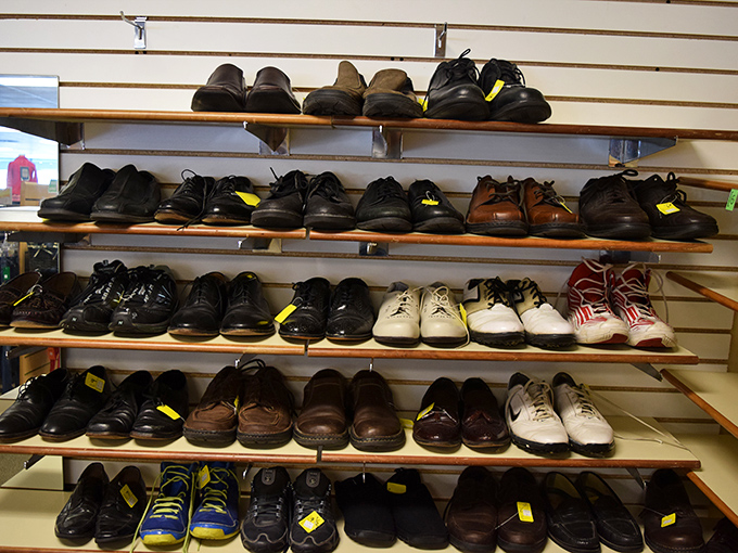 Men's shoes lined up like soldiers ready for duty&mdash;from barely-worn dress shoes to casual kicks just waiting for their next adventure.