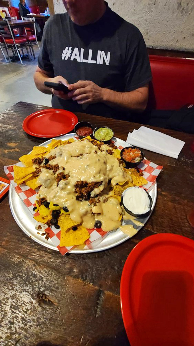 Nachos that require a strategy to eat. Each chip carries the perfect ratio of cheese, meat, and toppings&mdash;architectural masterpieces of flavor.