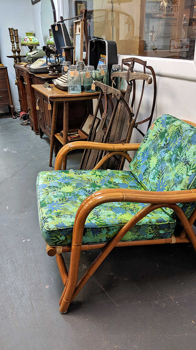 That bamboo lounge chair with tropical upholstery is practically screaming "Florida retirement circa 1972" in the best possible way.