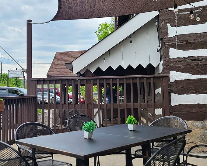 The outdoor seating area&mdash;where fresh air meets comfort food. Those little potted plants aren't fooling anyone&mdash;we're here for the calories.
