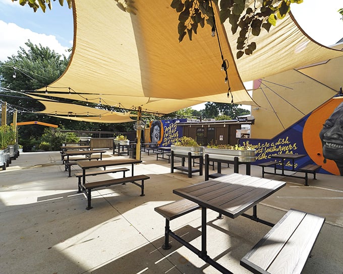 Dining under sail-like canopies with the Blue Ridge breeze &ndash; Asheville's outdoor eating at its most civilized and delightful.