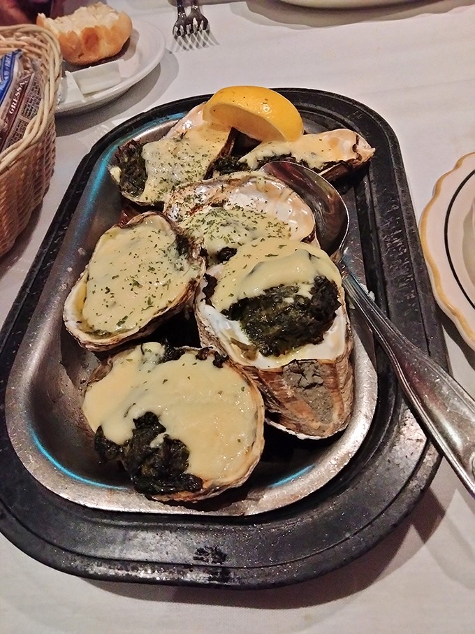 These Oysters Rockefeller aren't just appetizers &ndash; they're little boats of luxury sailing across your taste buds. Spinach and cheese never had it so good.