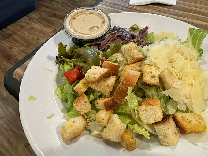 A salad that doesn't apologize for being healthy. Those homemade croutons are the supporting actors stealing the scene.