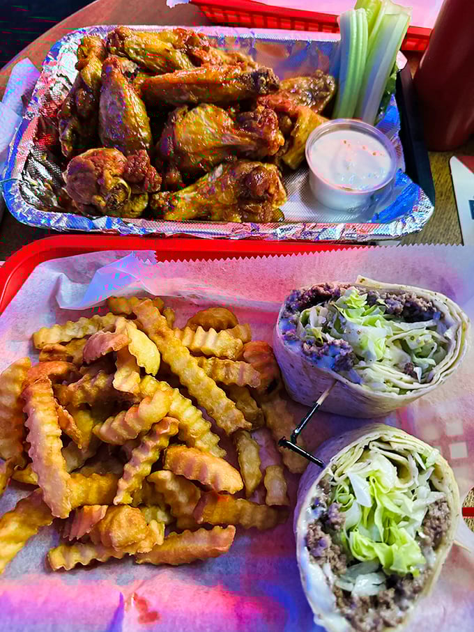 A feast fit for sharing (but you won't want to). Wings, wraps, and fries create the holy trinity of bar food perfection.