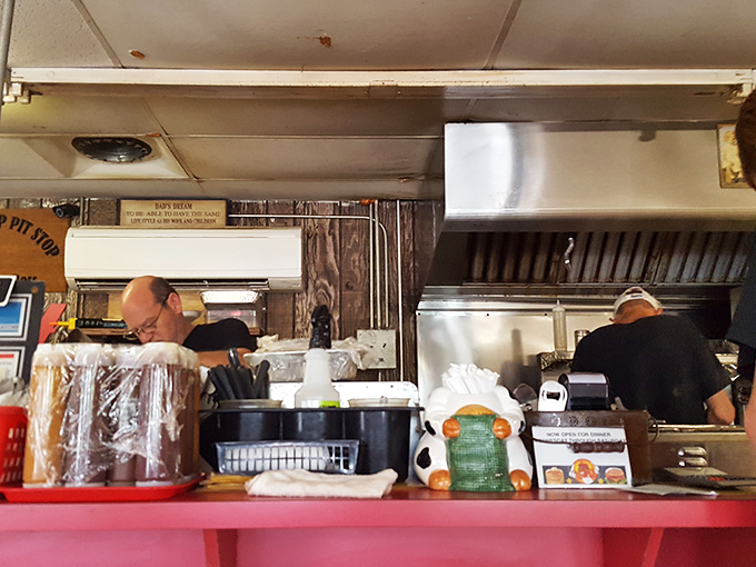 The open kitchen view&mdash;where breakfast dreams come true and the staff moves with the practiced choreography of people who know their craft.