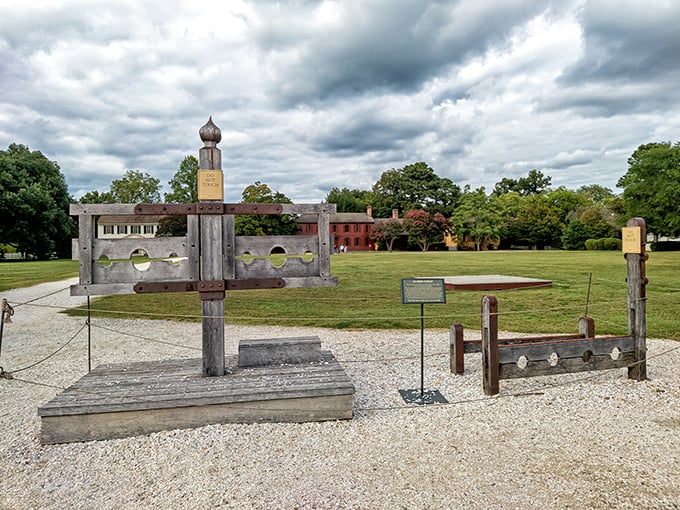 Colonial punishment devices on display—a stark reminder that before timeout corners, discipline was considerably more public and dramatically less comfortable.
