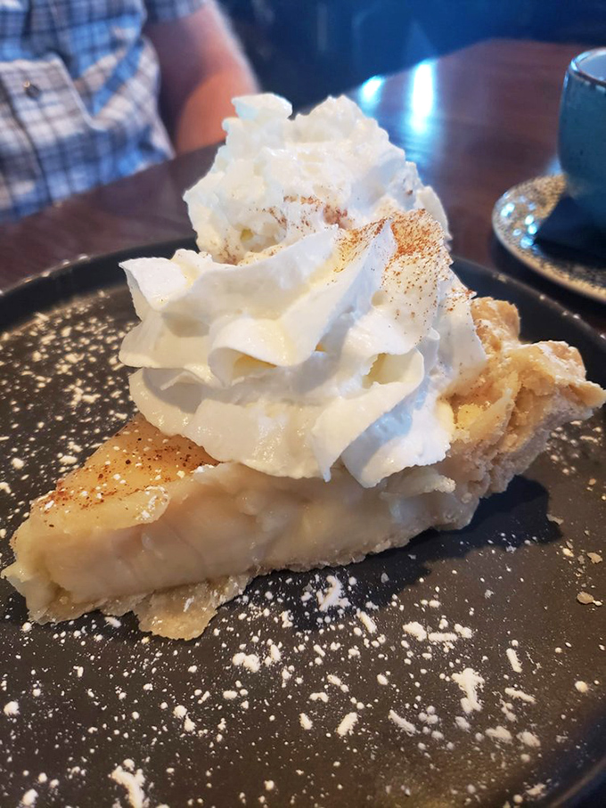 Sugar cream pie that makes you understand why it's Indiana's official state dessert. That cloud of whipped cream is just showing off at this point.