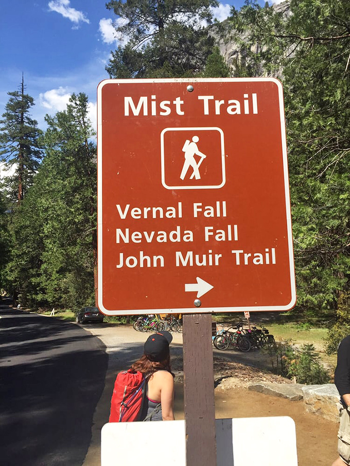 The sign that launches a thousand adventures. Three legendary trails converge here, each promising different levels of "I can't believe I did that" satisfaction.