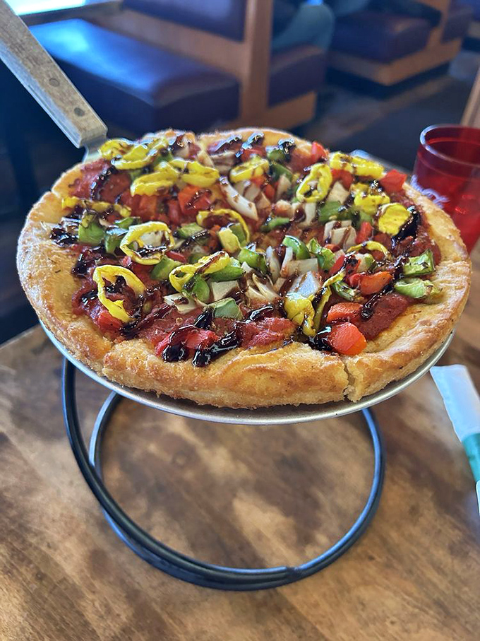 A veggie pizza so vibrant it could convince even the most dedicated carnivore to take a walk on the plant side, at least for one meal.