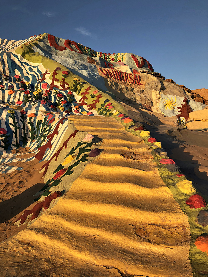 Follow the yellow path to... salvation? This sun-drenched stairway offers both physical and metaphorical ascension for desert wanderers.