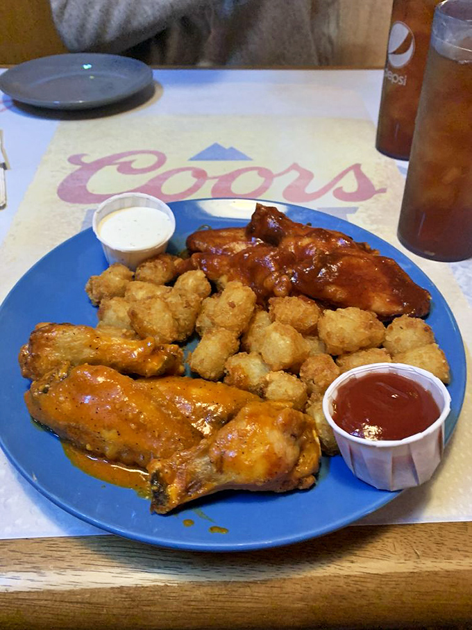 Buffalo wings and tater tots &ndash; proof that sometimes the simplest pleasures are the most satisfying. Comfort food that speaks directly to your soul.