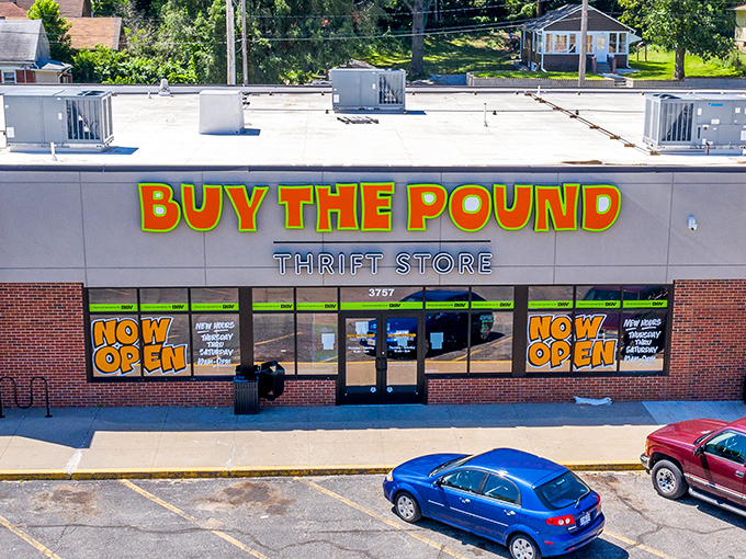 "Buy The Pound" announces itself with carnival-bright letters. This isn't shopping&mdash;it's a weigh-and-pay adventure!