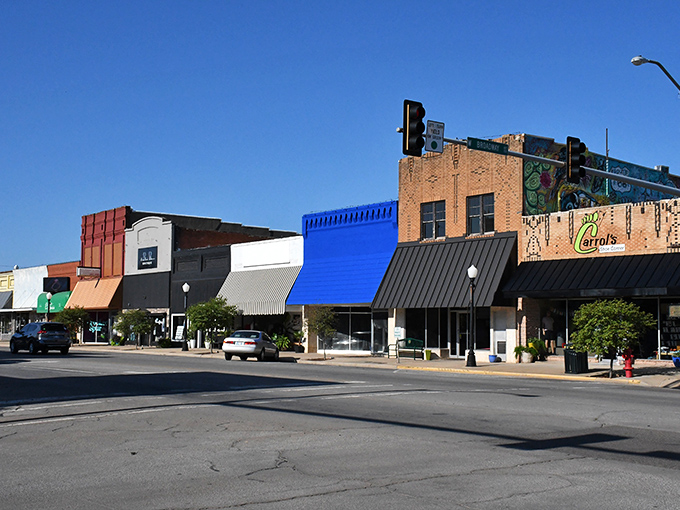 Elk City's Plaza Theatre stands as a pastel sentinel of entertainment past. Movies without twenty minutes of previews!
