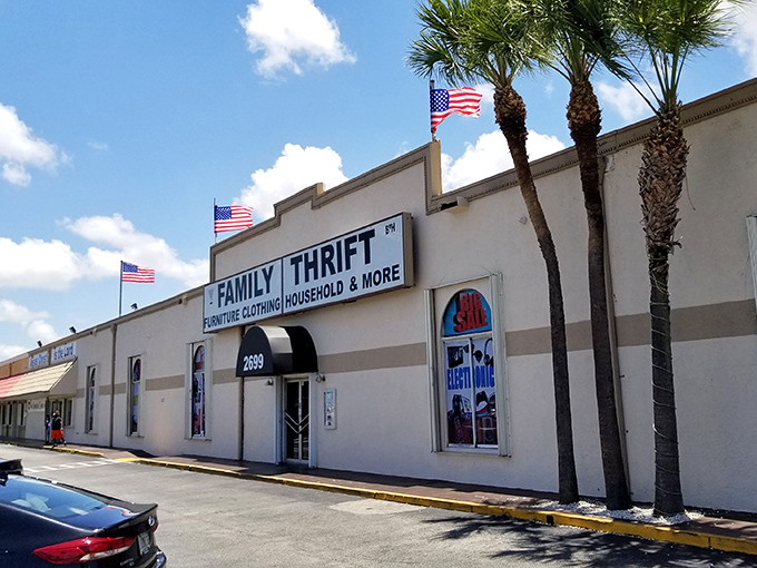 Family Thrift's no-nonsense exterior with American flags proudly waving &ndash; patriotic bargain hunting at its finest!