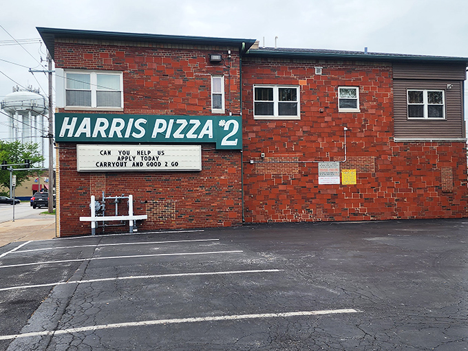 Harris Pizza's no-frills exterior focuses on what matters: that iconic Quad Cities-style pizza waiting inside.