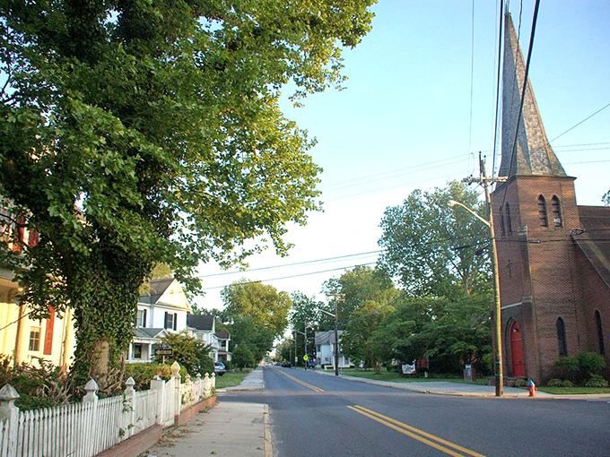 Laurel's historic church spire watches over quiet streets where your retirement dollars stretch further than you might expect.