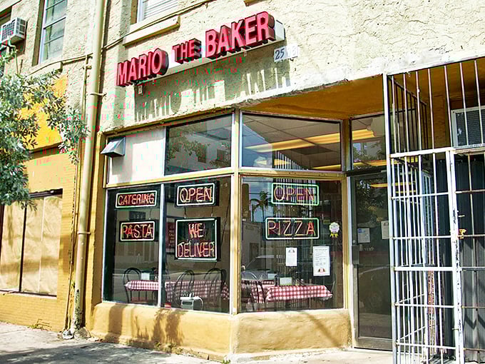 Mario the Baker's bold red sign has guided hungry Miamians for decades. This no-nonsense exterior hides generations of pizza wisdom.